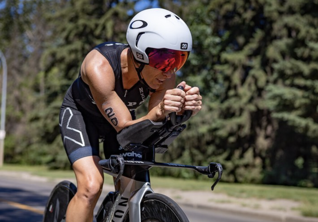 Sarah Crowley and Eric Lagerstrom break the tape at IM 70.3 Santa Cruz ...