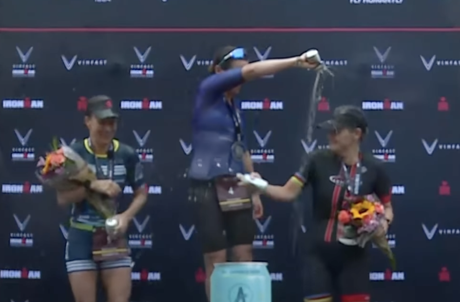 Chloe Lane celebrates victory at Ironman Wisconsin - Triathlon Today